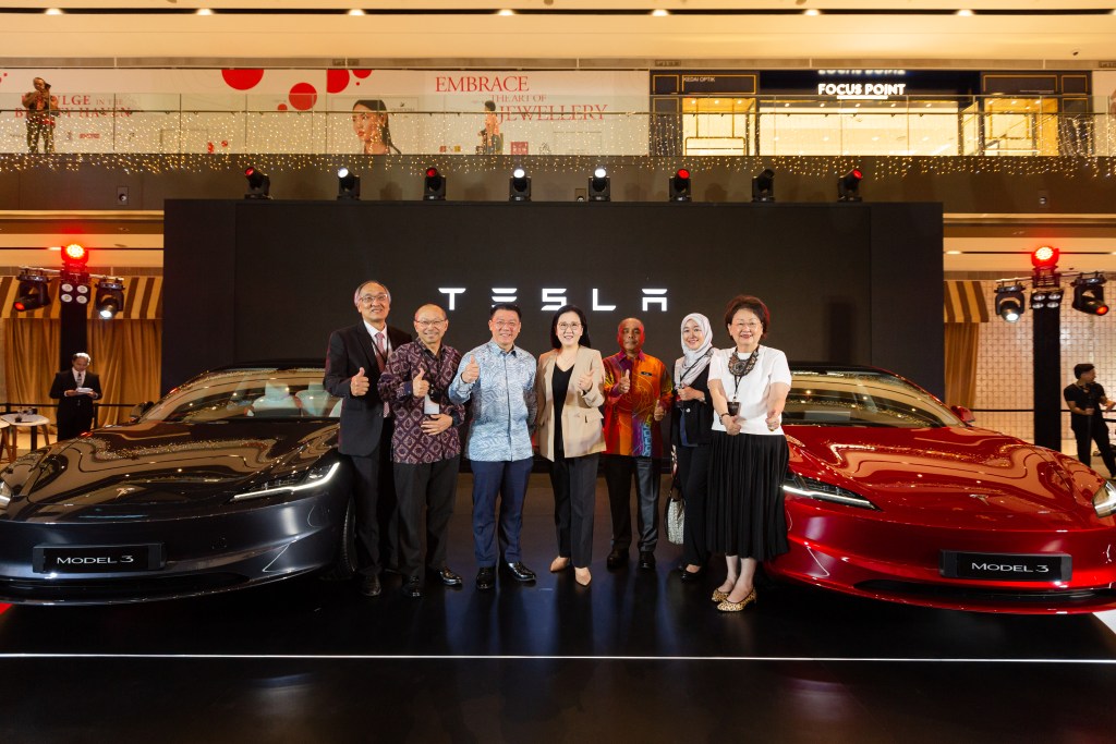 Tesla officially launches latest Model 3 and first Tesla Flagship ...